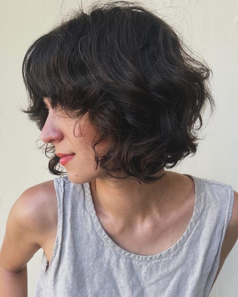 Walk The Streets Of Paris With The Chic French Bob With Bangs