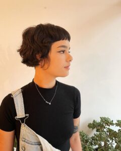 Walk The Streets Of Paris With The Chic French Bob With Bangs