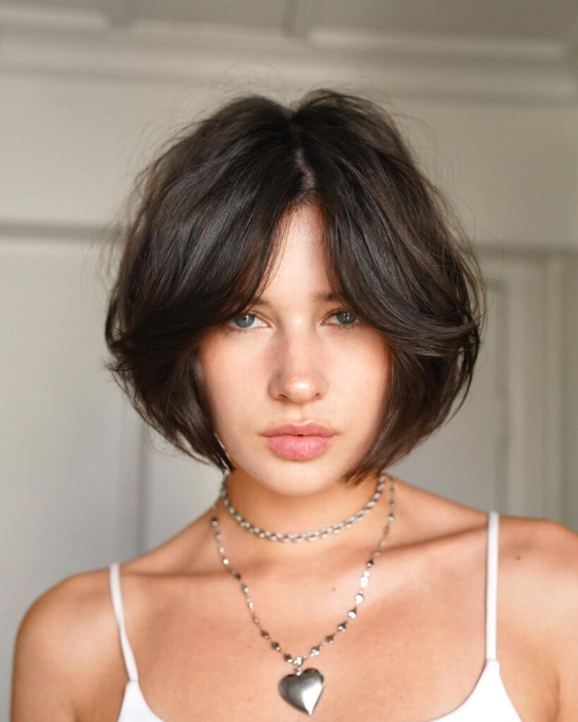 Walk The Streets Of Paris With The Chic French Bob With Bangs