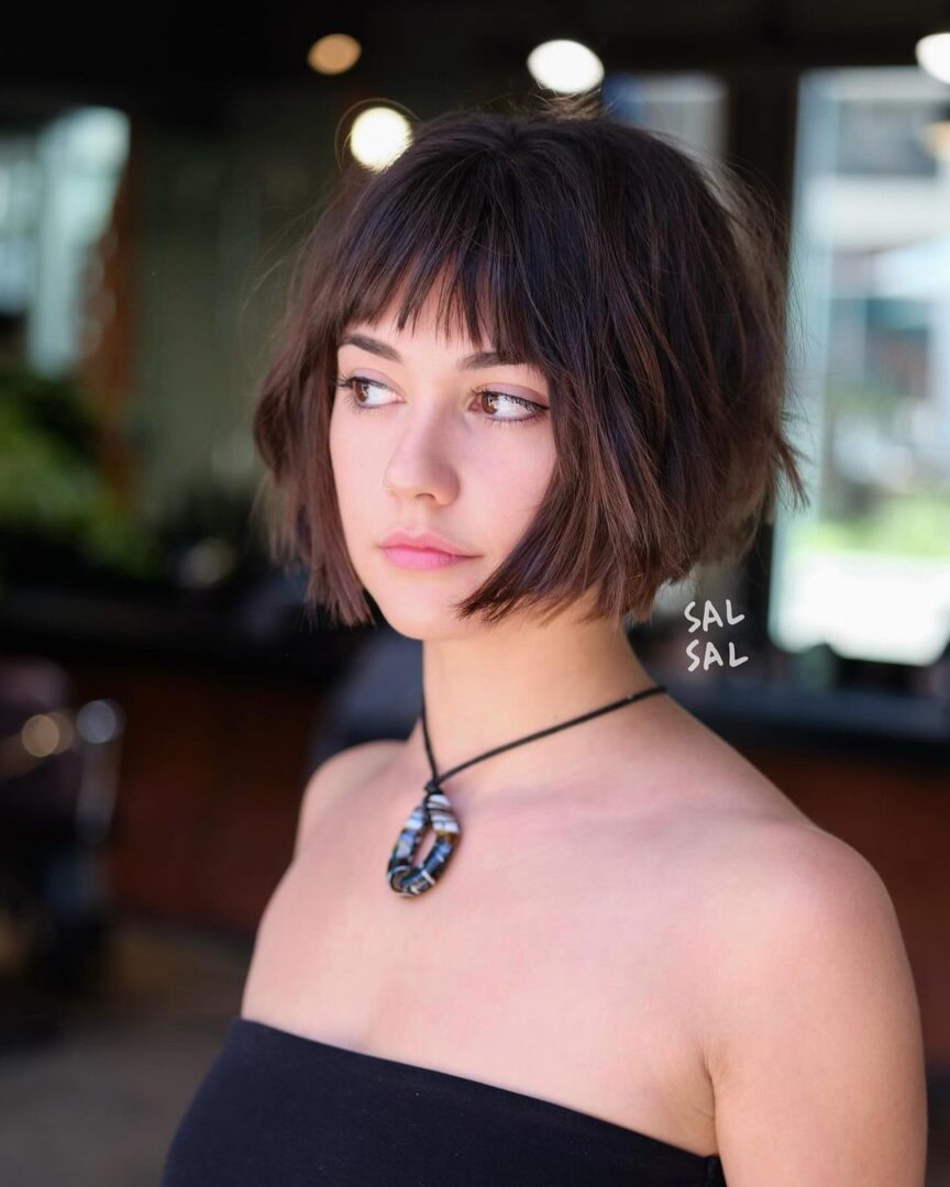 Walk The Streets Of Paris With The Chic French Bob With Bangs